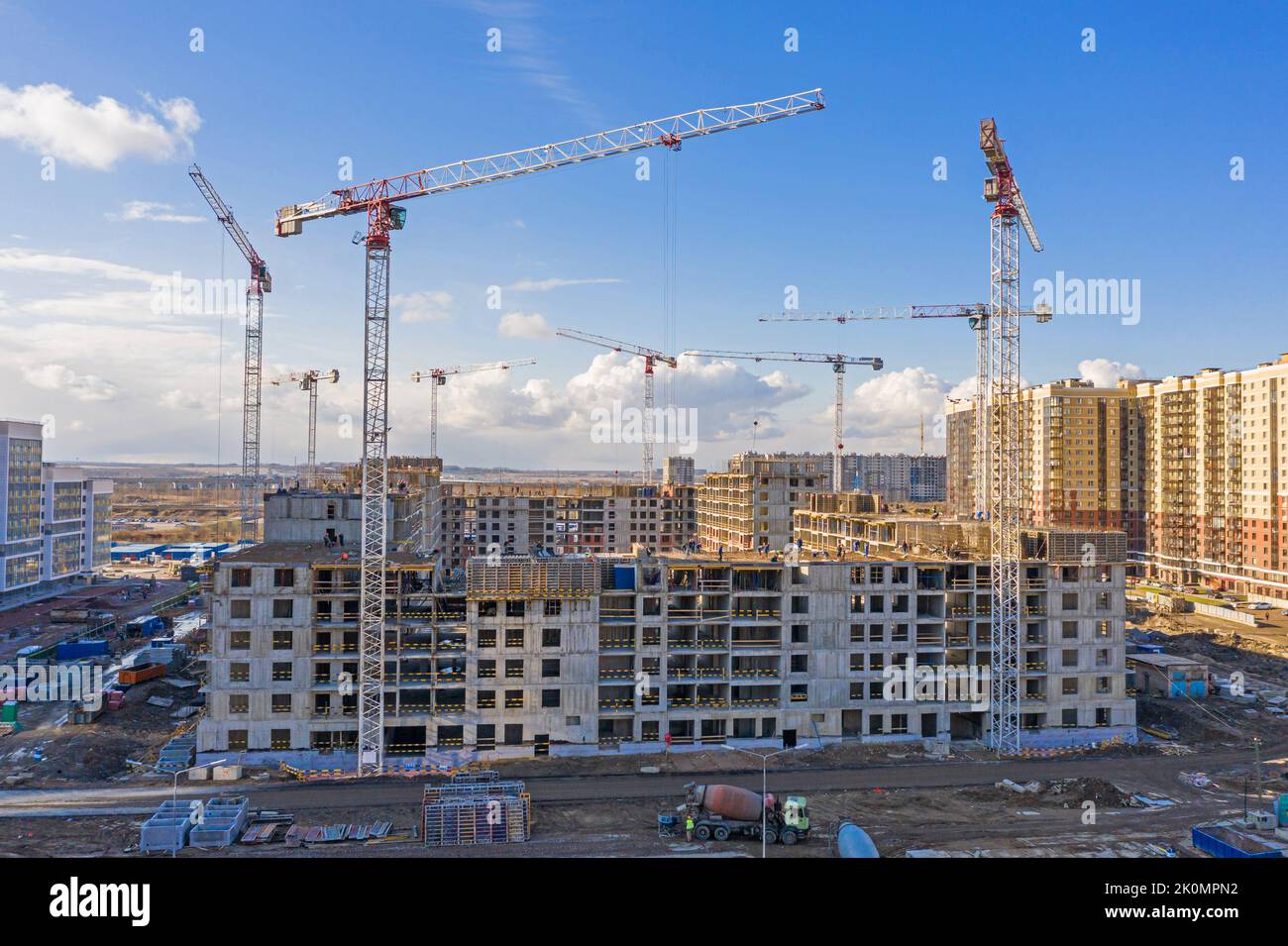Building construction site, tall residential complex and cranes Stock ...