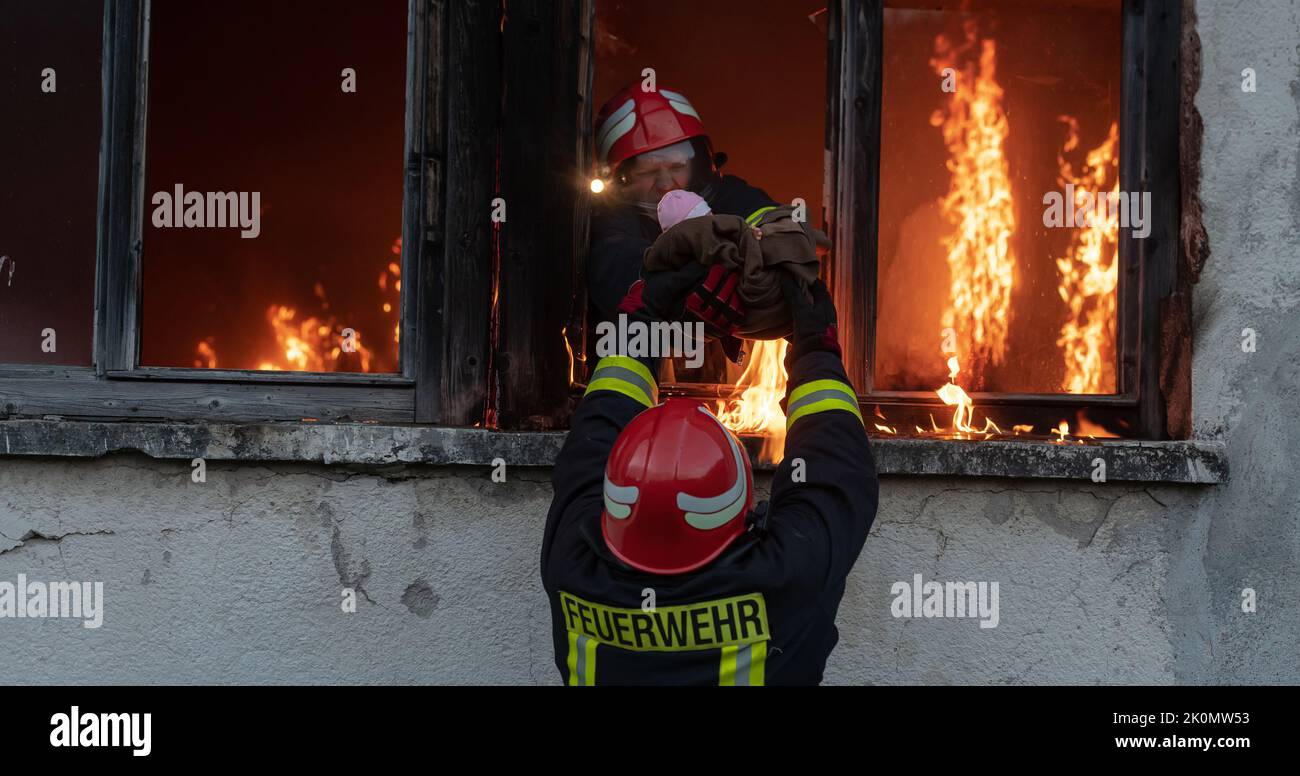 Firefighter Carrying Baby
