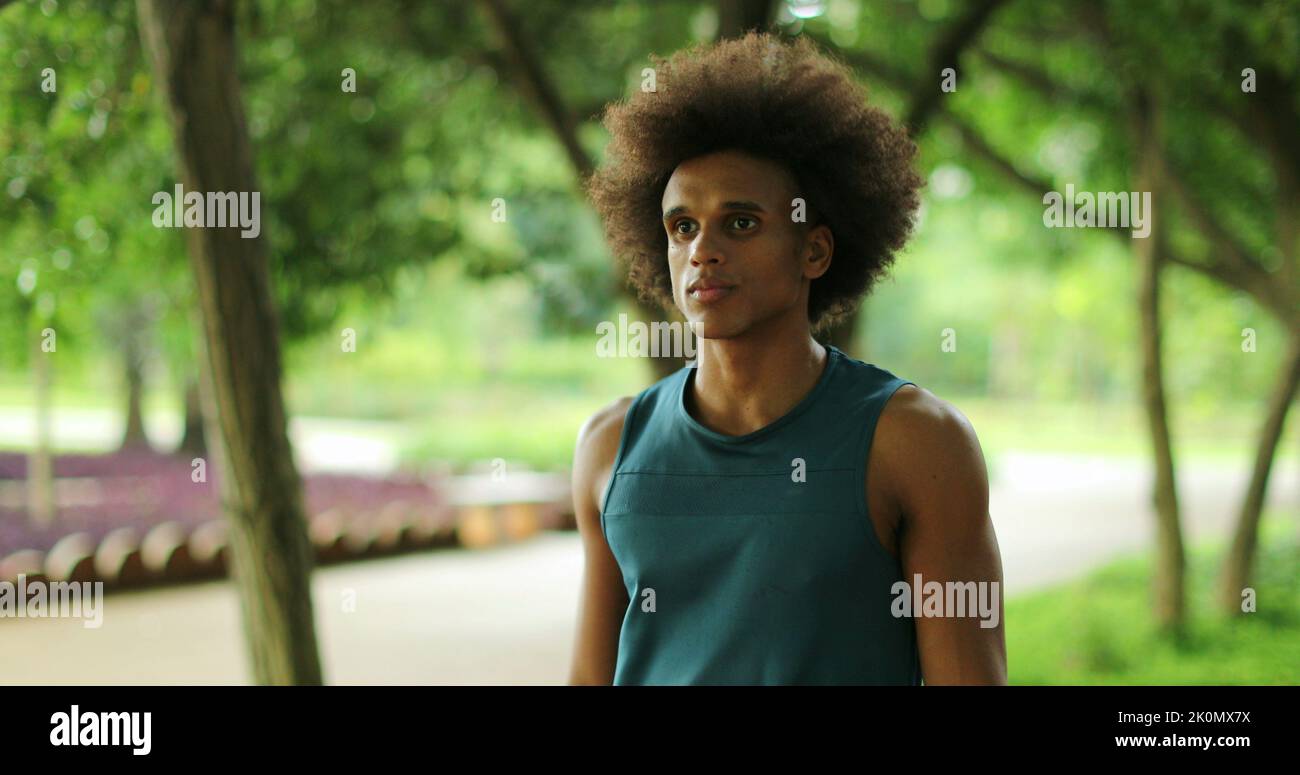 Young black handsome african man walking at park pathway Stock Photo ...