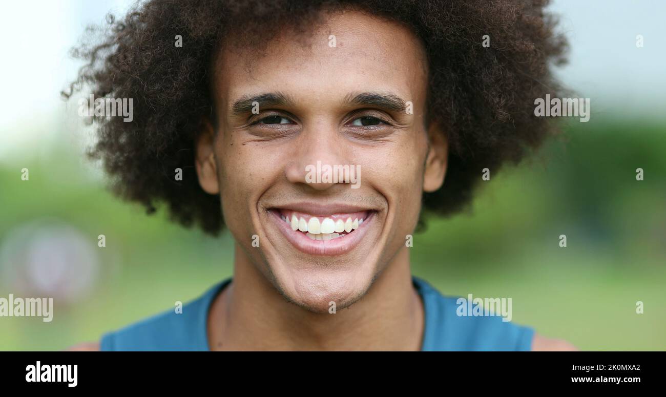 Young handsome mixed ethnicity man closing eyes taking deep breath and ...