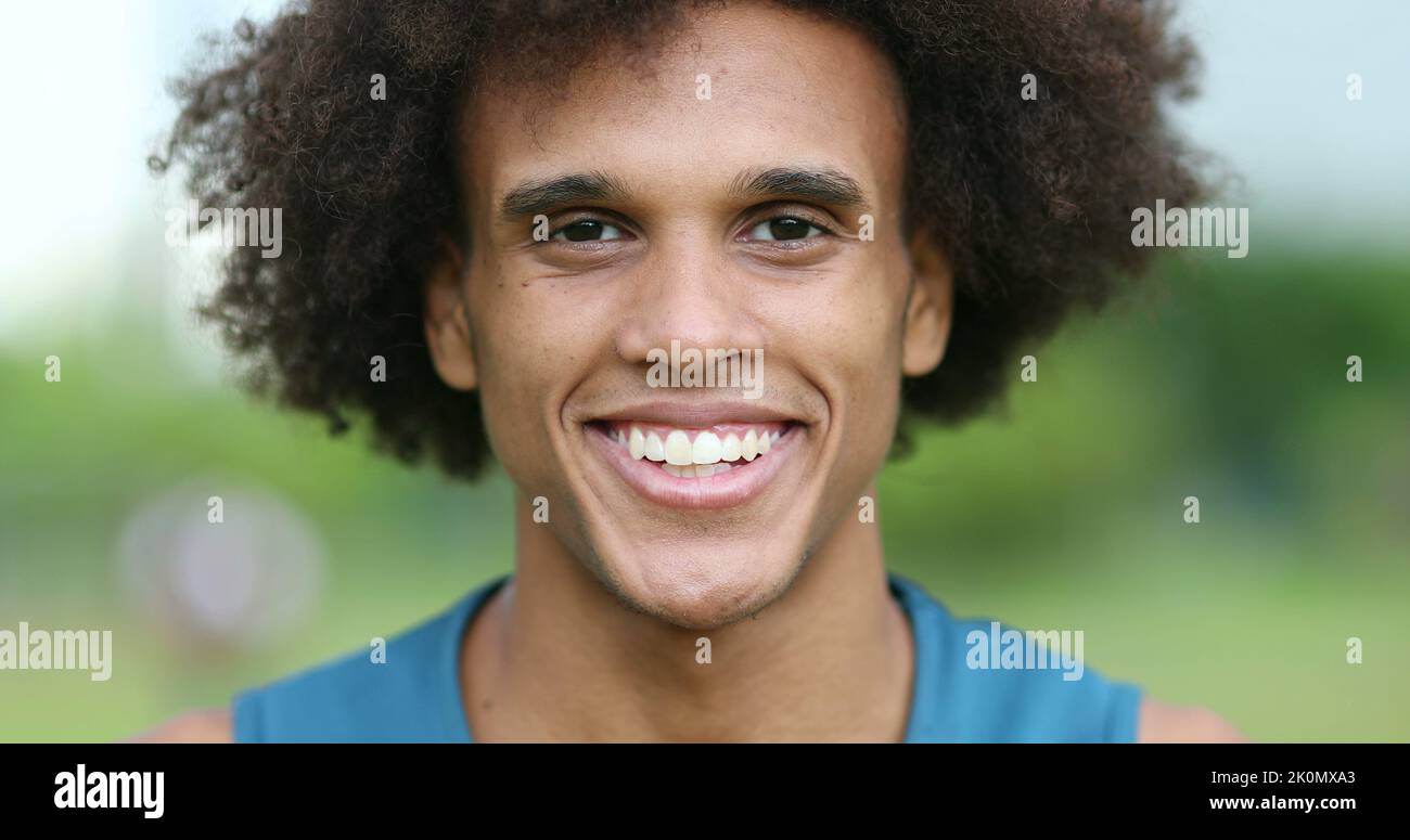 Young handsome mixed ethnicity man closing eyes taking deep breath and ...
