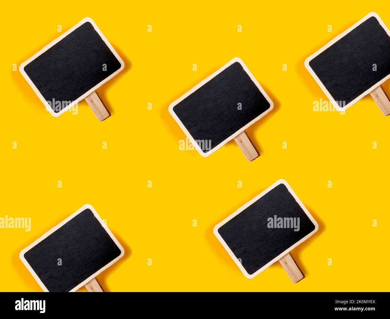 Mini Blackboards Chalkboards With Copy Space On Yellow Background