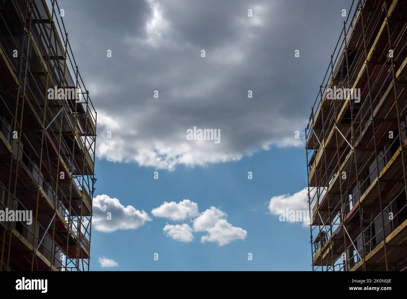 A narrow corridor between two building shells Stock Photo - Alamy