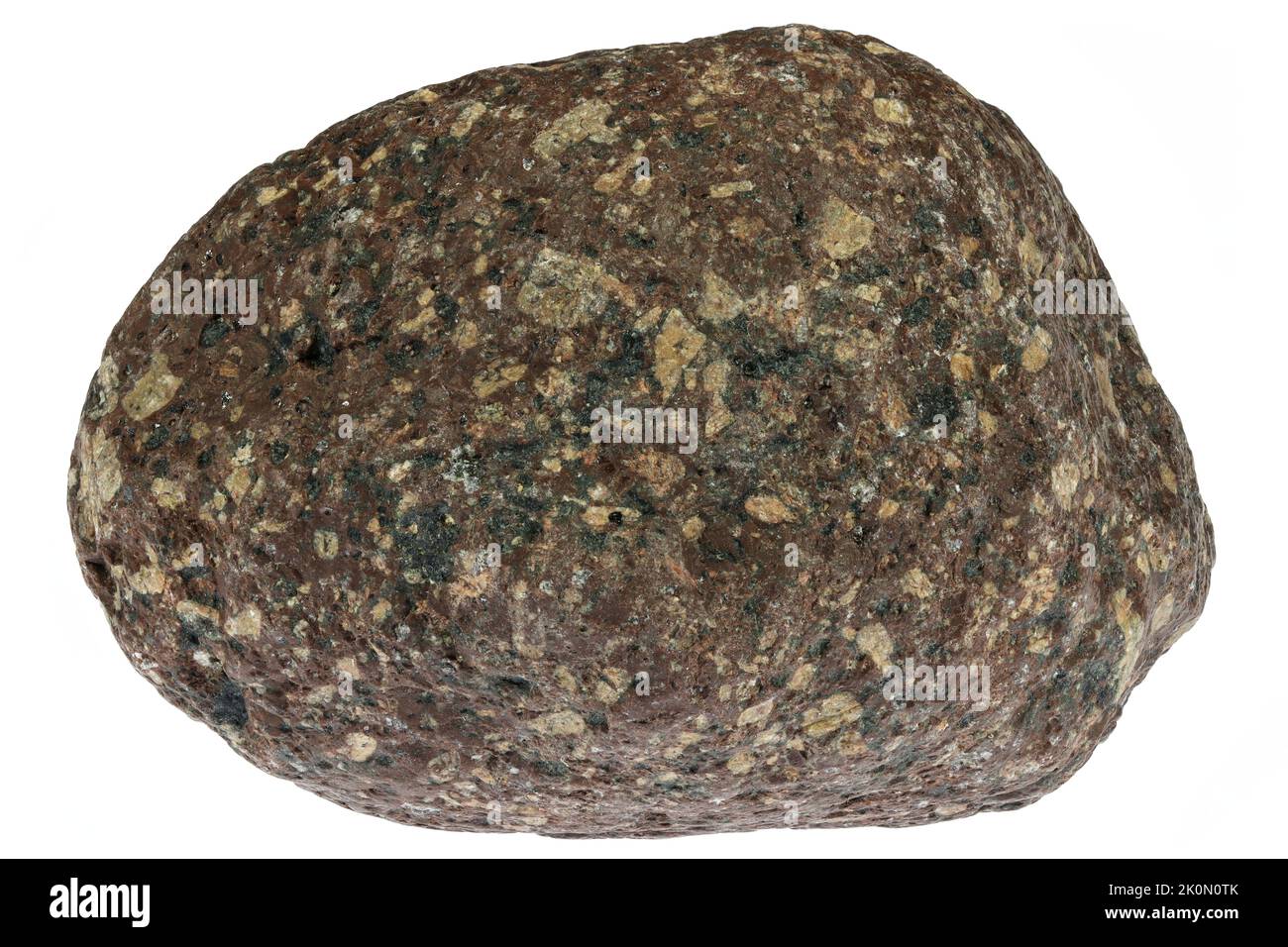 porphyry from the Baltic Sea coast in Waabs, Germany isolated on white ...