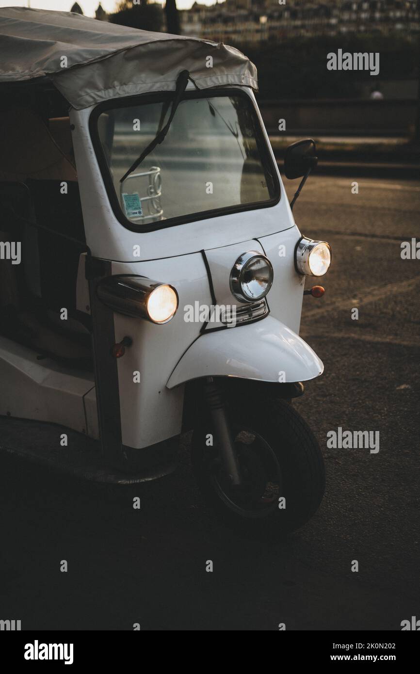 A frontal view of a white Piaggio Ape Stock Photo - Alamy