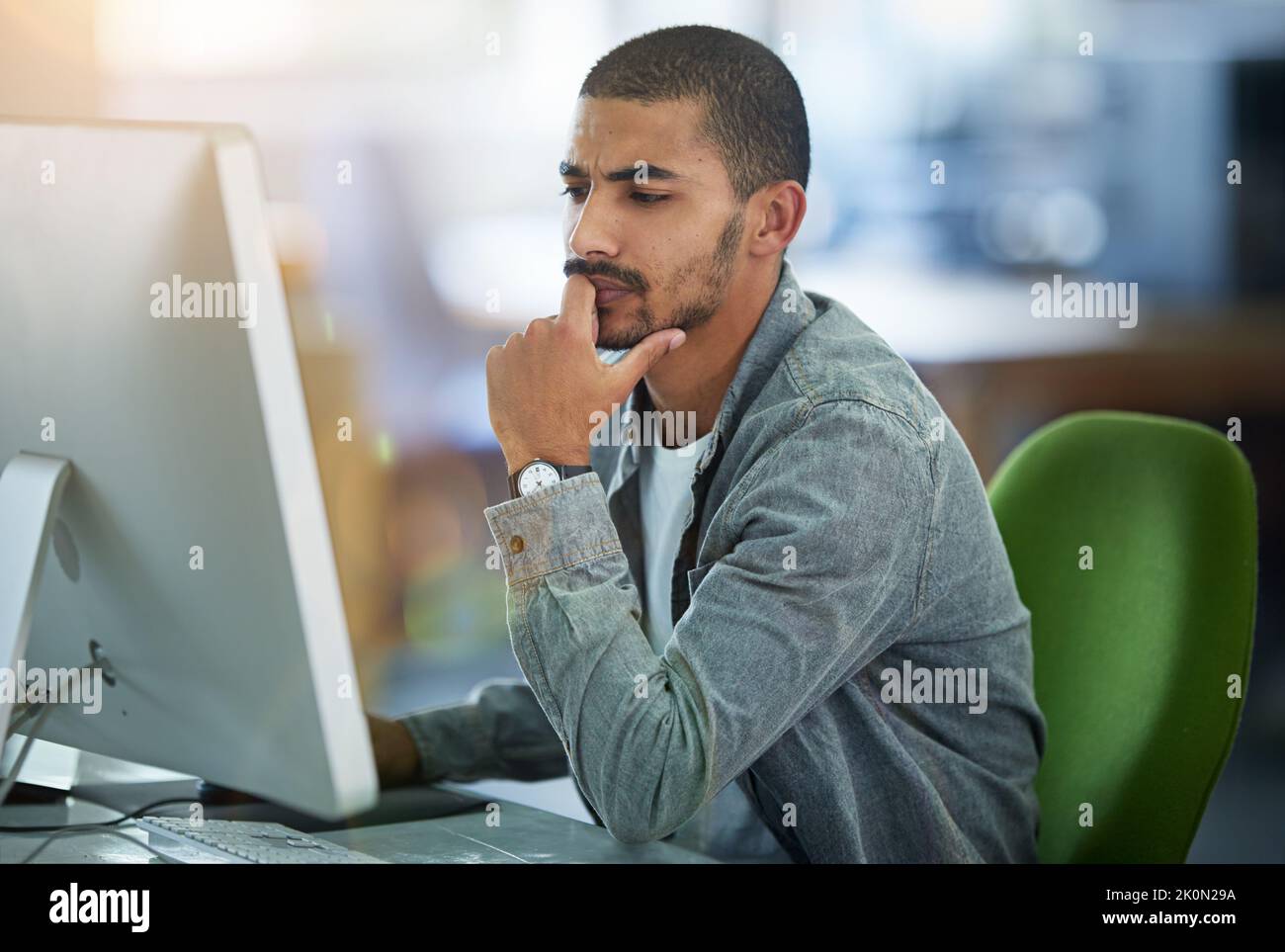 This one is a thinker...a young designer deep in thought while working ...