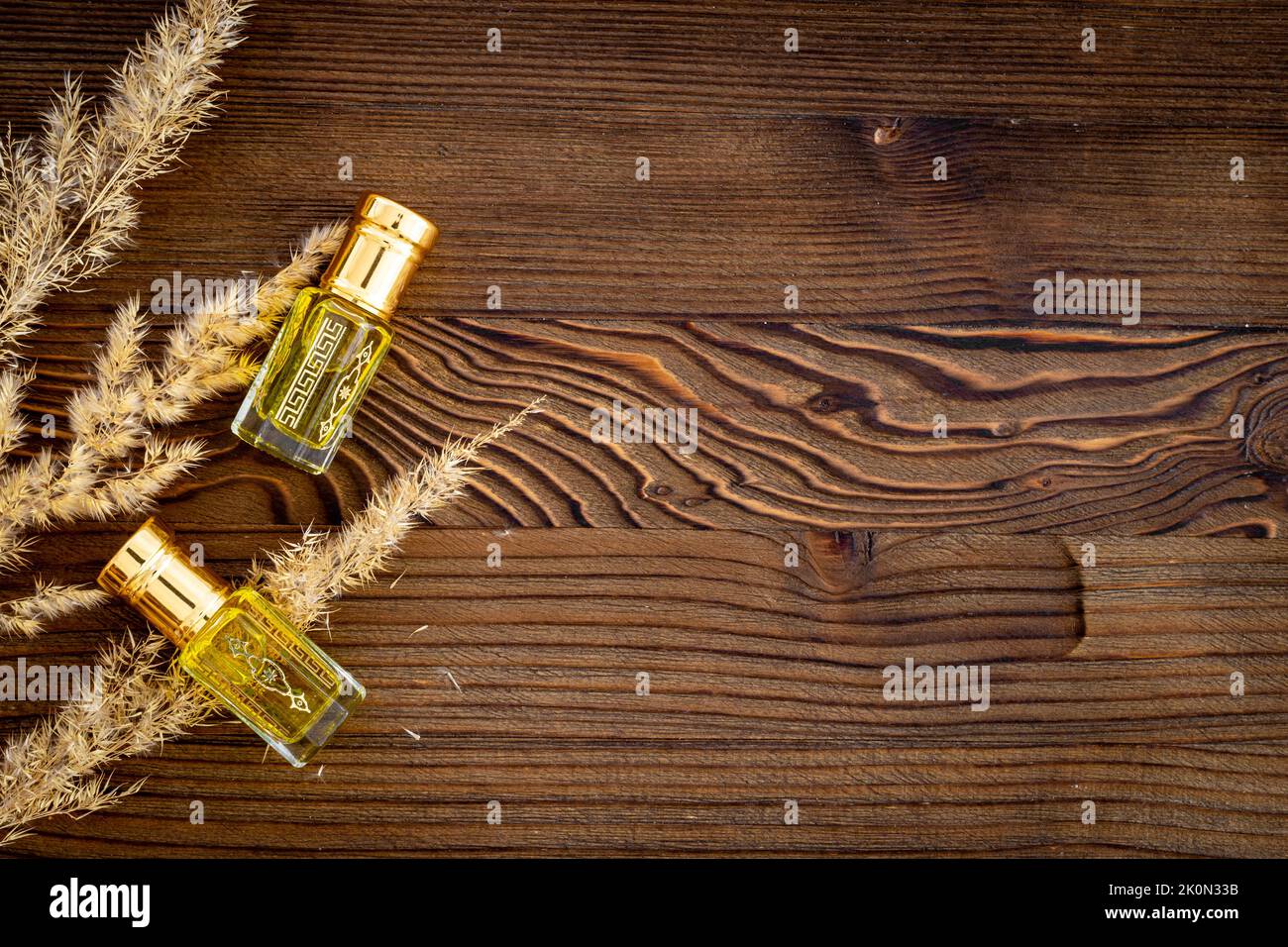 Glass bottles of perfume Oud oil. Aromatic Arabian oil Stock Photo - Alamy