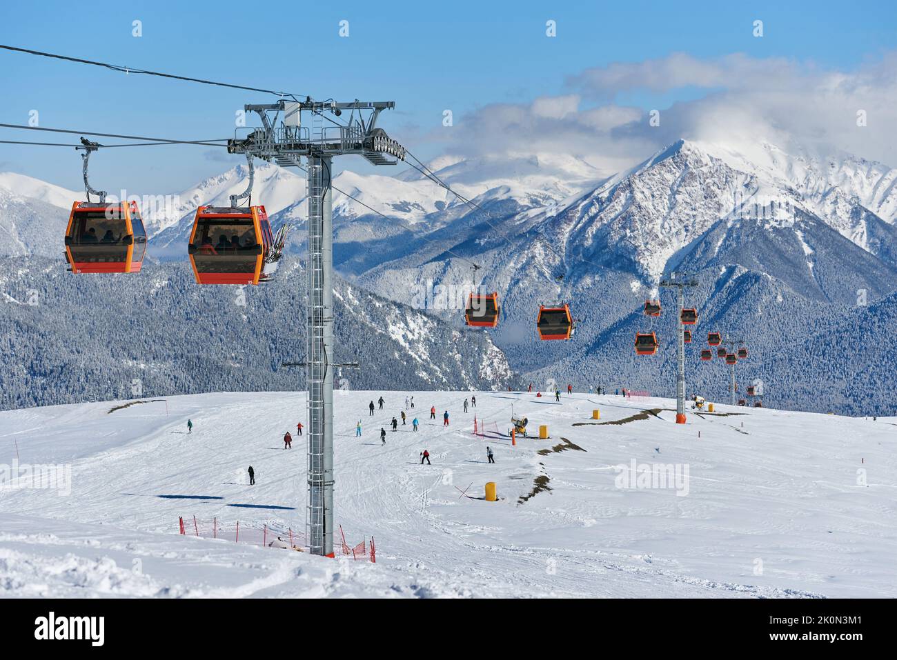 Ski lift in the snowy mountains of Arkhyz resort city in Russia Stock ...