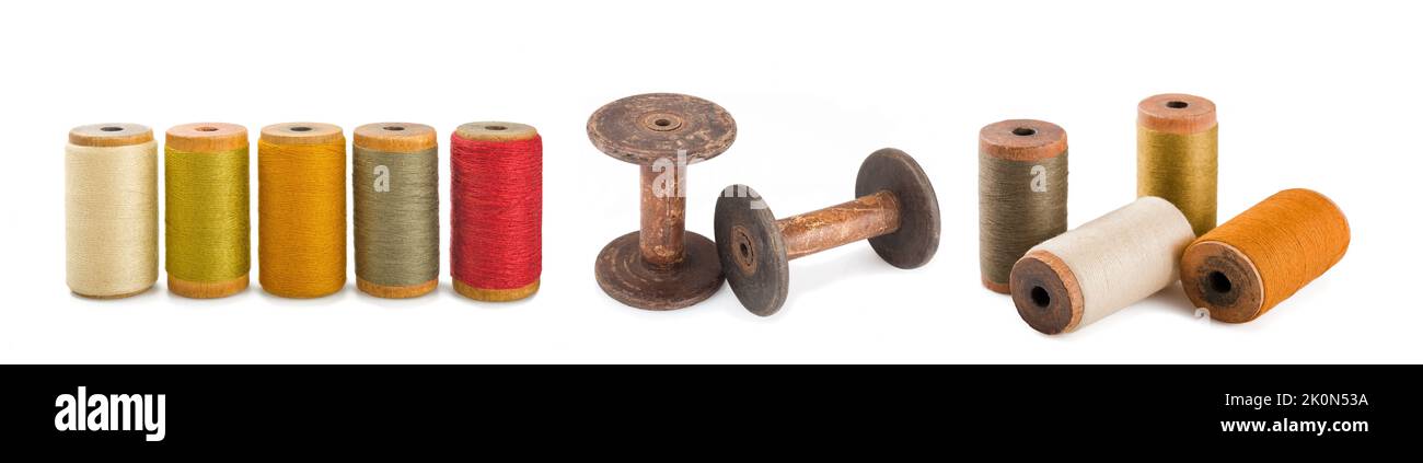 Old thread spools isolated on white background Stock Photo - Alamy