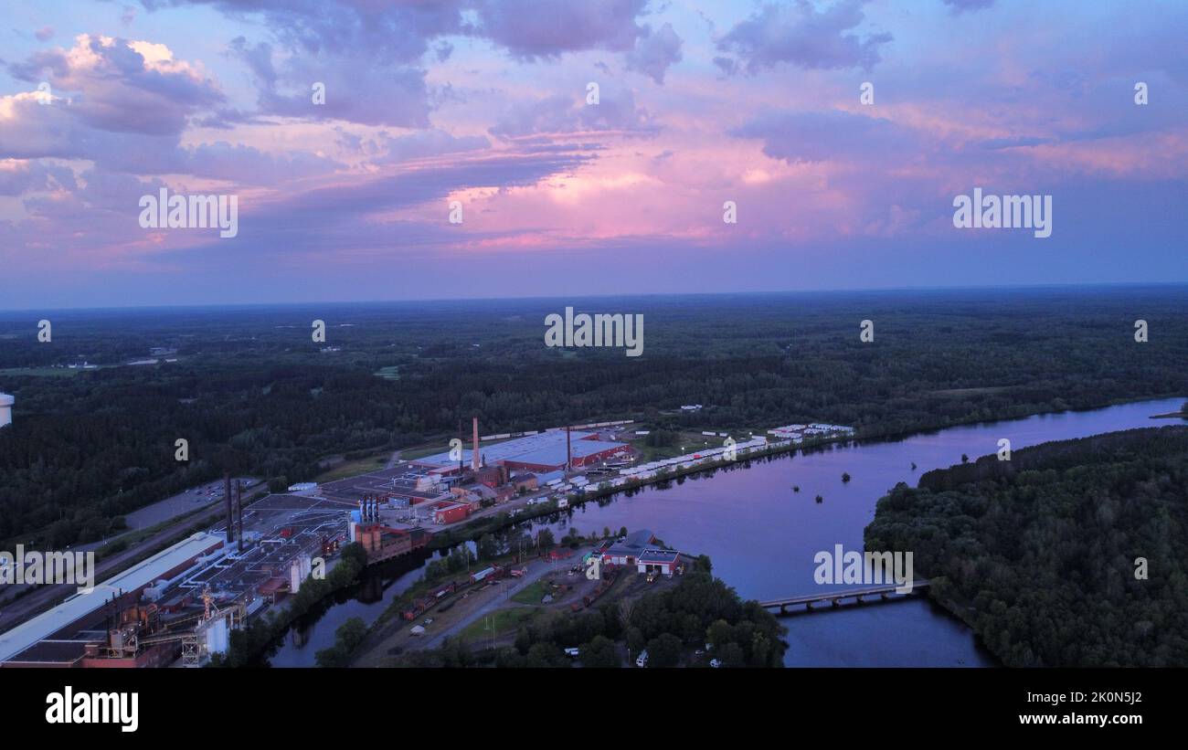 An aerial view of a scenic sunset over a riverside city Stock Photo - Alamy
