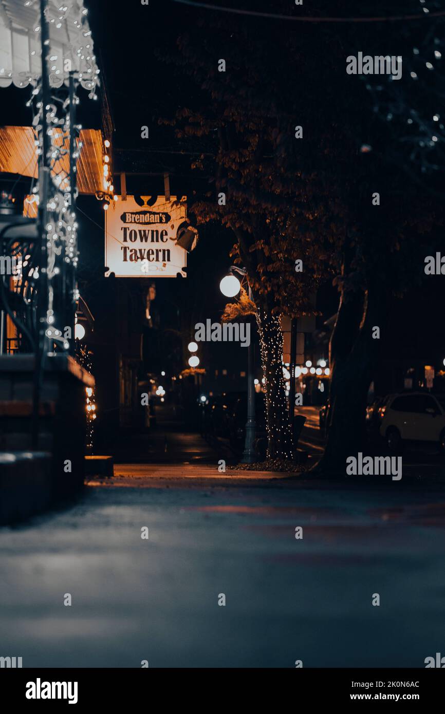 Small town sidewalk at night Stock Photo - Alamy