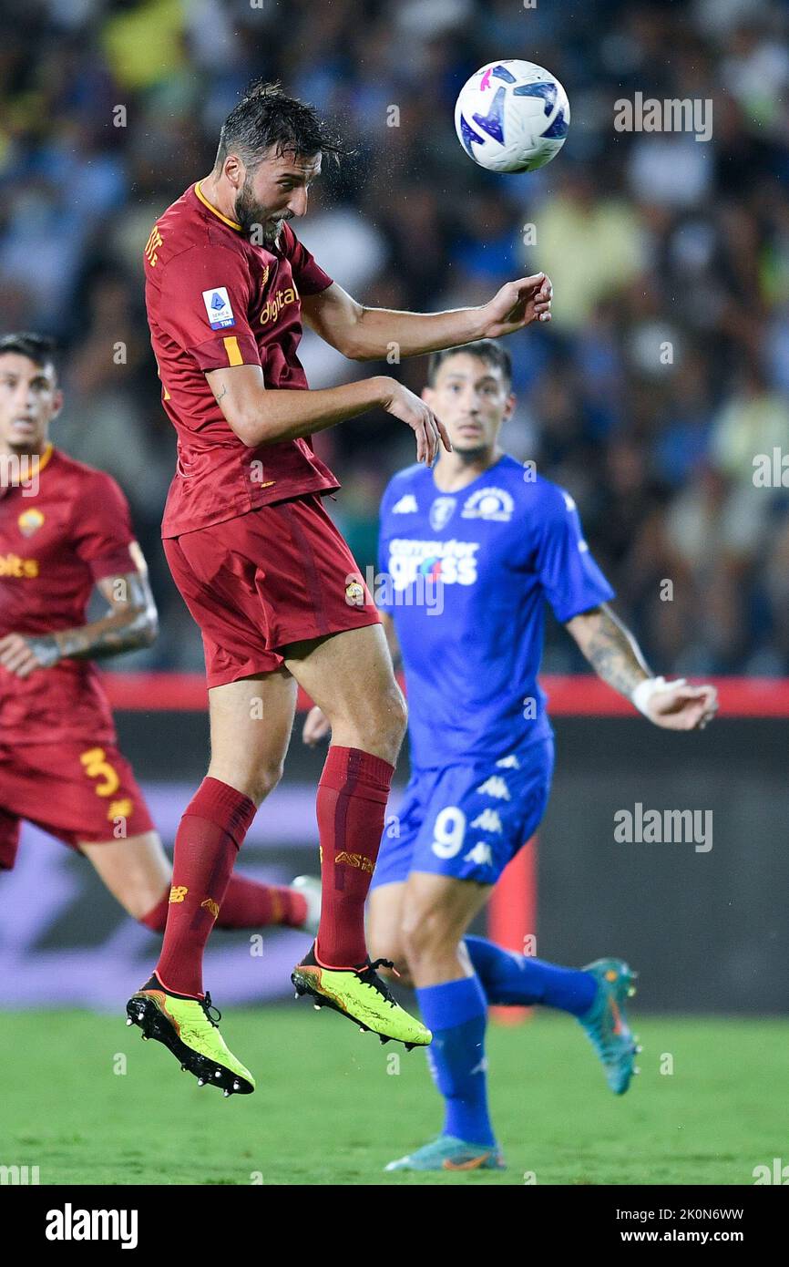 Empoli, Italy. 12th Sep, 2022. Bryan Cristante of AS Roma jumps for the ...