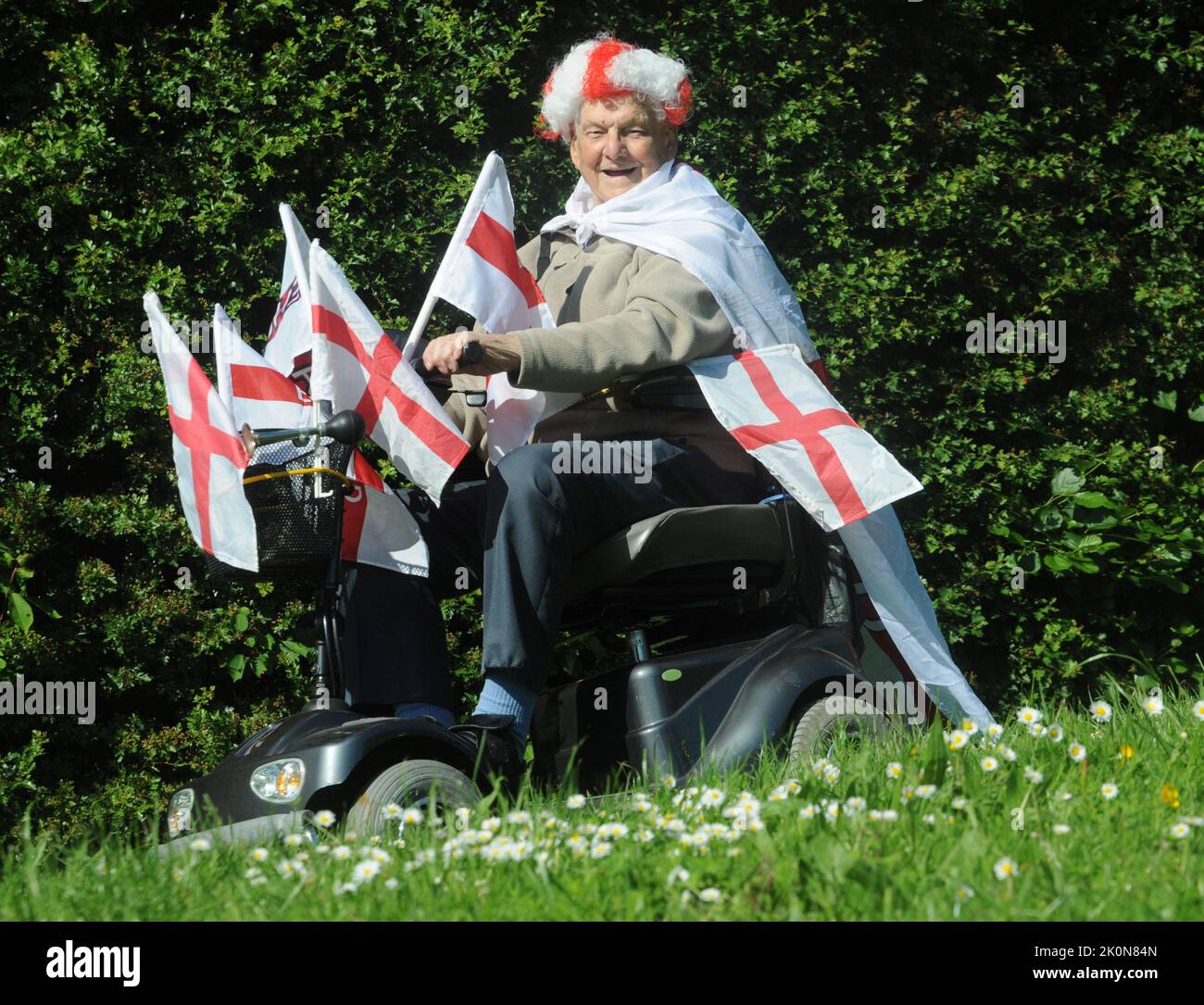 88 YEAR OLD RALPH HOLMES SHOWS HIS COLOURS AS HE RIDES HIS SCOOTER ...
