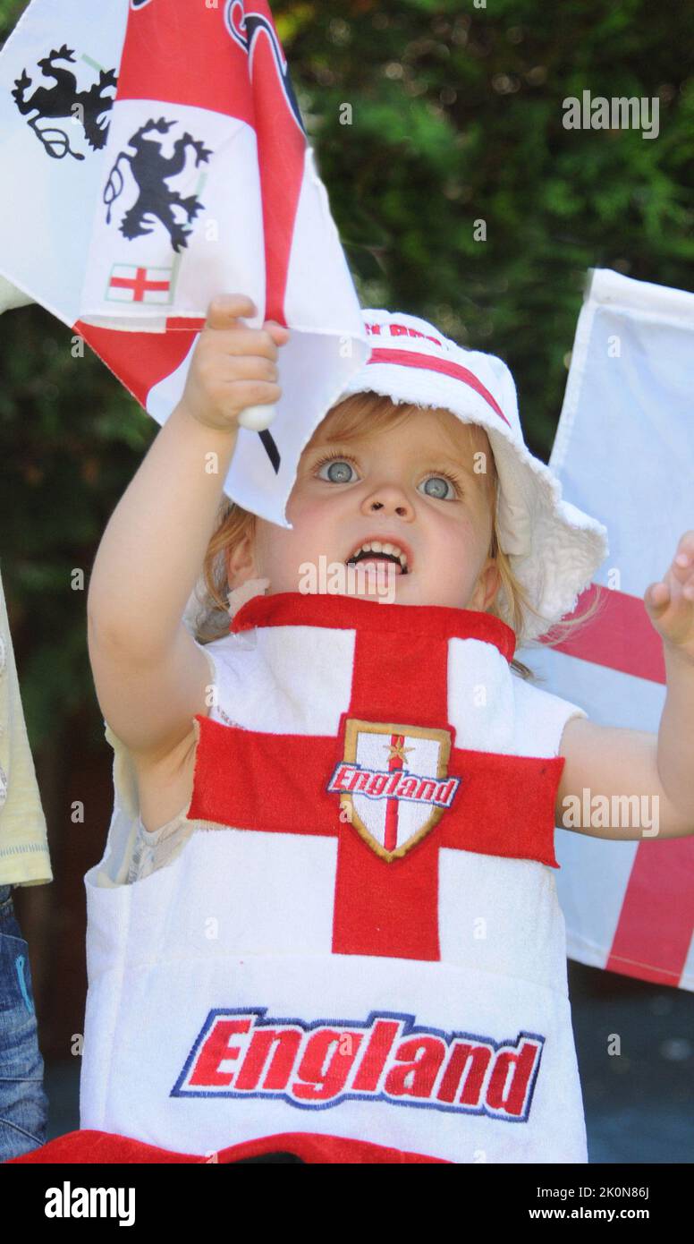 2 YEAR OLD HANNAH GRIMSHAW FROM PORTSMOUTH IN HER ENGLAND COLOURS WAVES ...