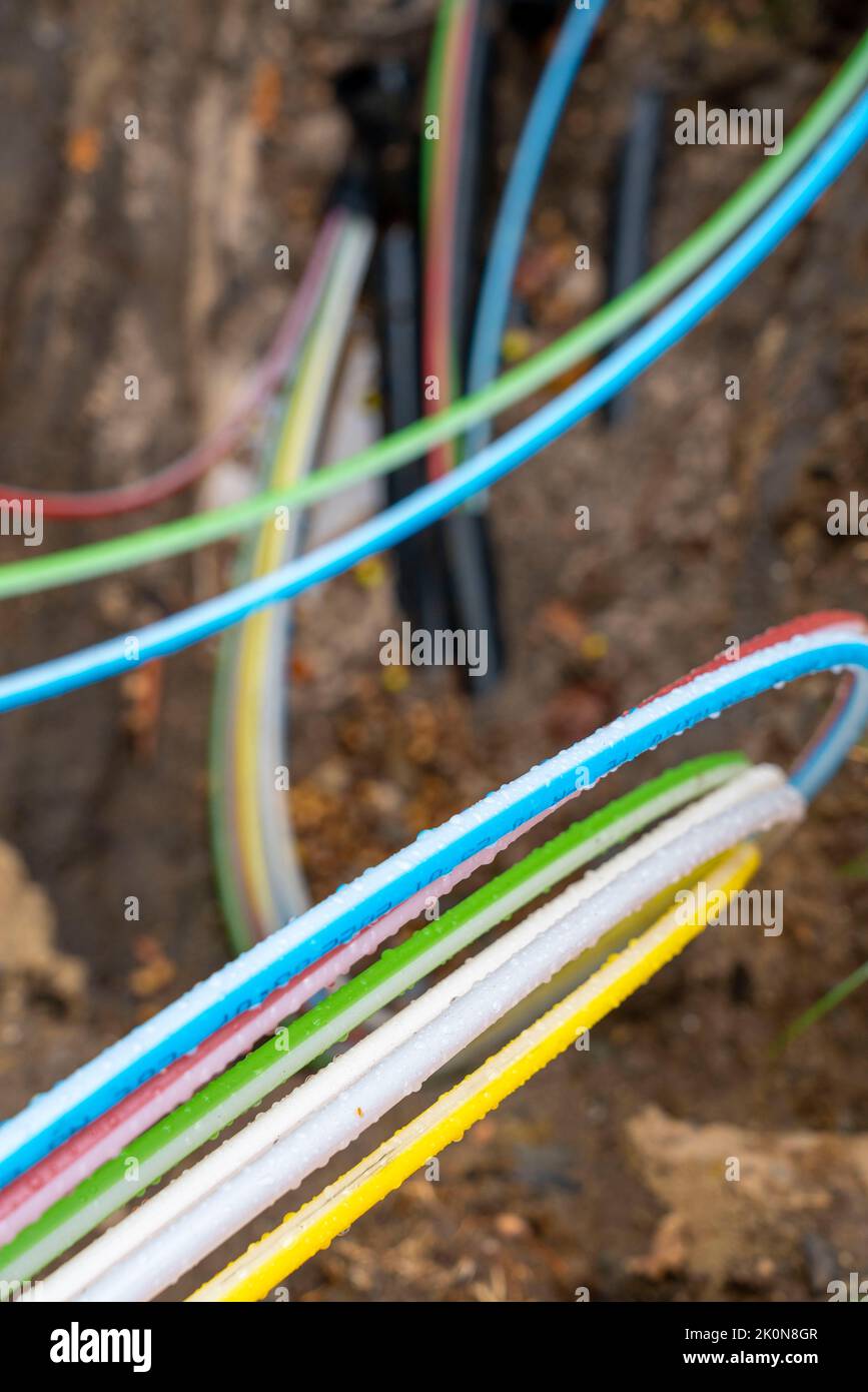 Laying of fibre optic cables, construction site, excavation pit ...
