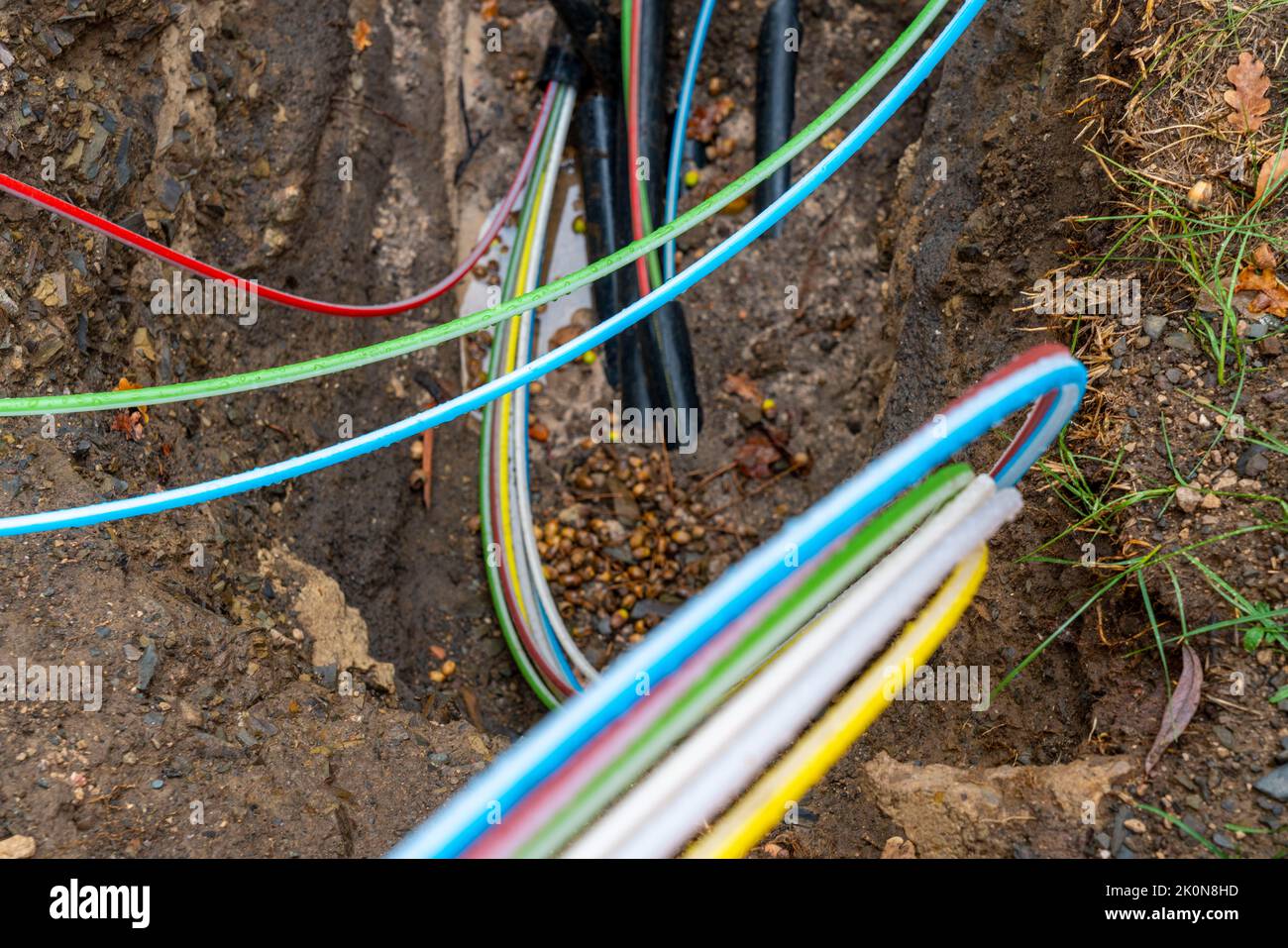 Laying of fibre optic cables, construction site, excavation pit ...