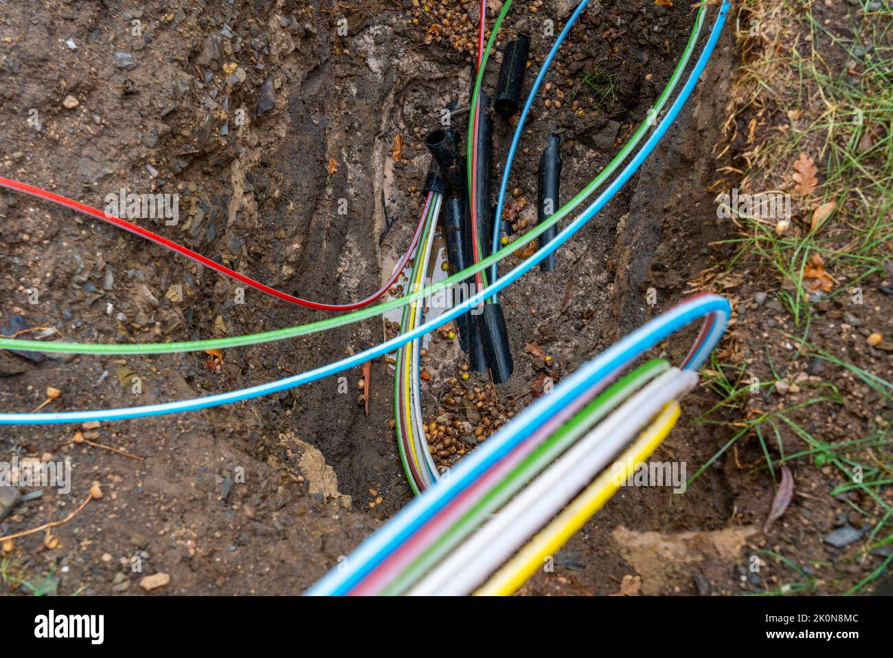 Laying of fibre optic cables, construction site, excavation pit ...