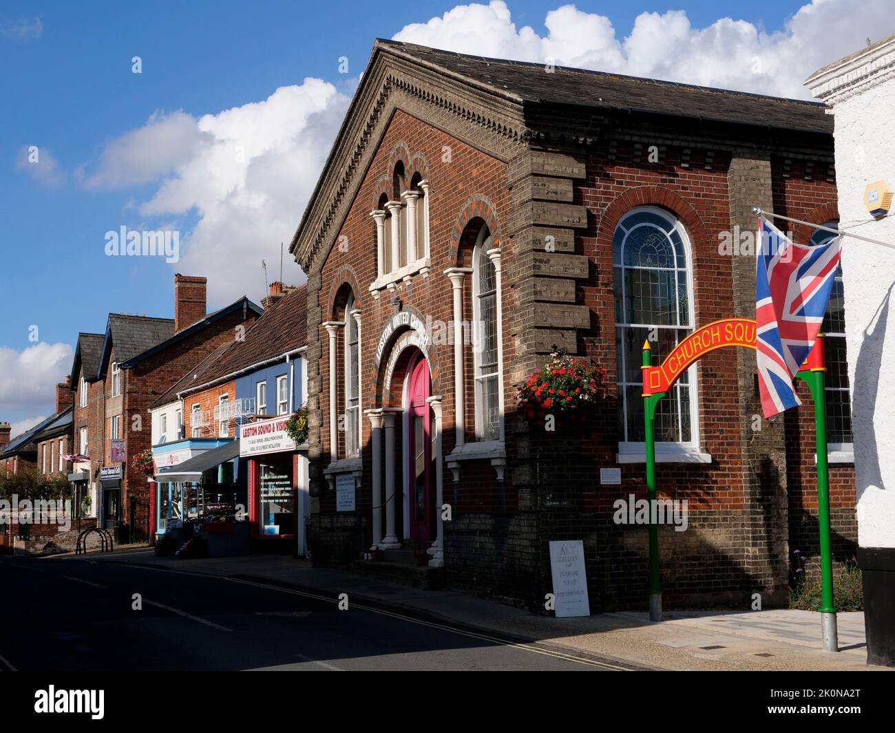 Leiston High Street and Church Square, Union Jack flag flying in the ...
