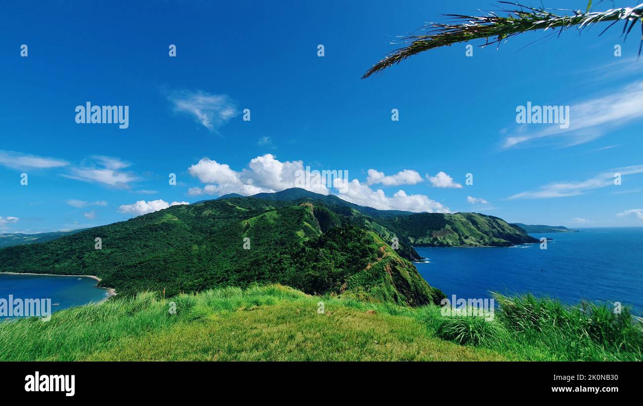 A bird's eye view of a green island by beaches Stock Photo - Alamy