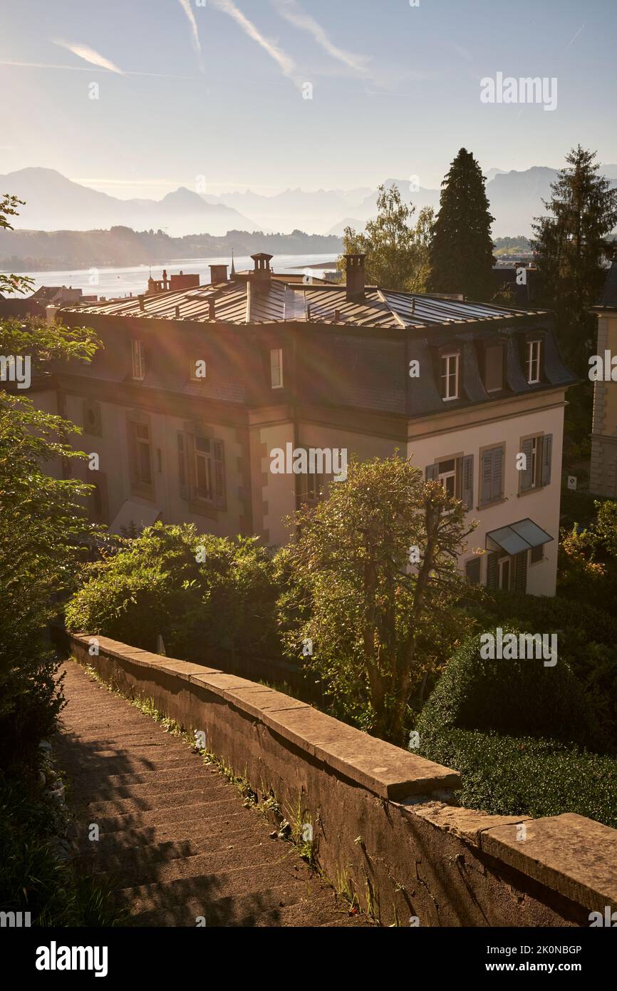 Steps and house on lake shore Stock Photo - Alamy