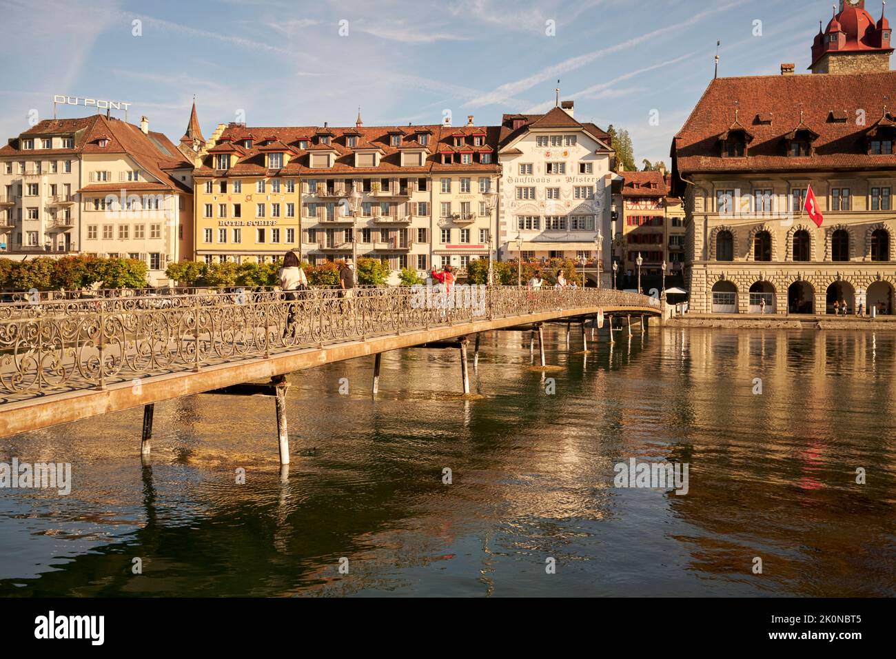 Old bridge over river in city historic district Stock Photo - Alamy