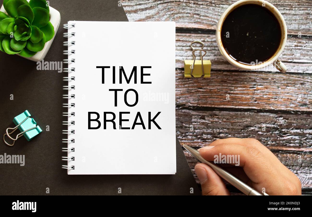 Time to Break Text written on notebook page, pencil on the right ...
