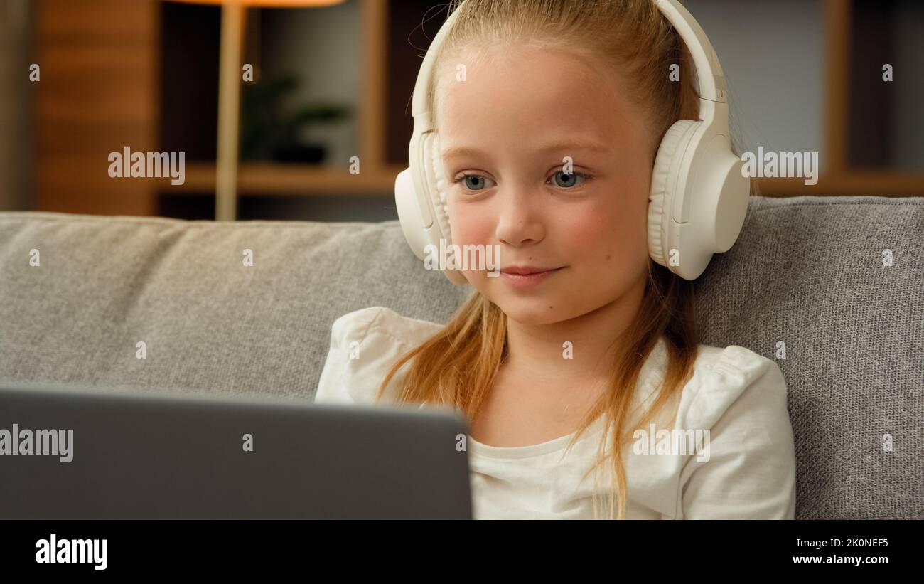 Funny little blonde girl child cute schoolgirl pretty beautiful kid ...