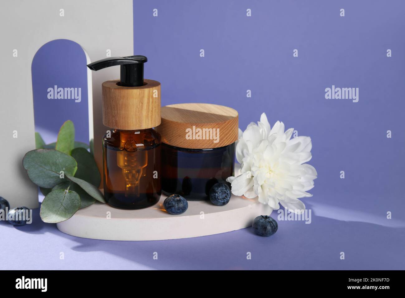 Composition with natural cosmetics and plaster decor on lilac ...