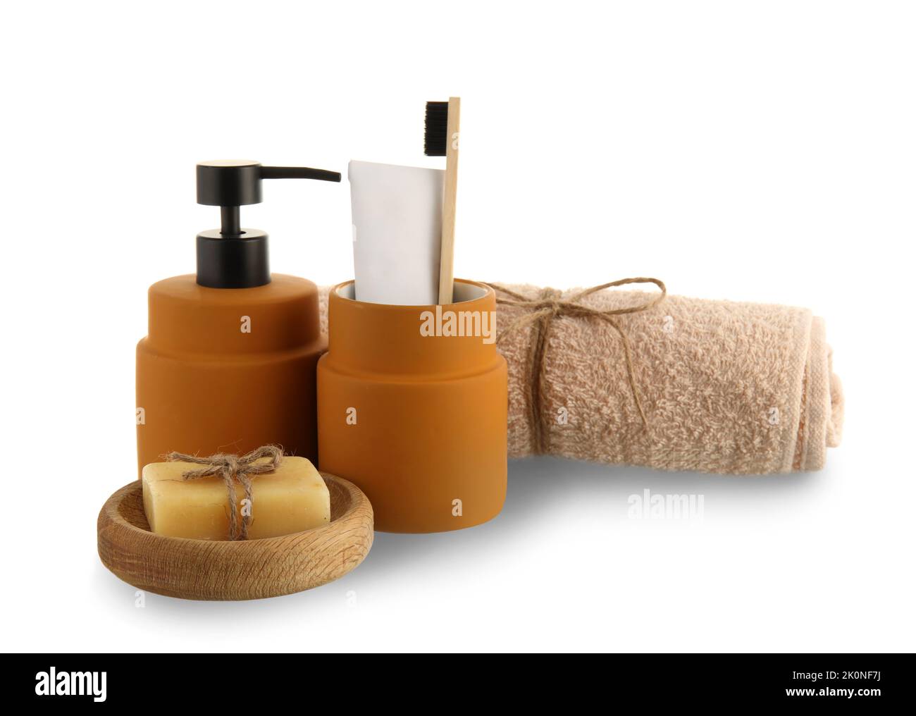 Set of bath supplies with towel on white background Stock Photo - Alamy
