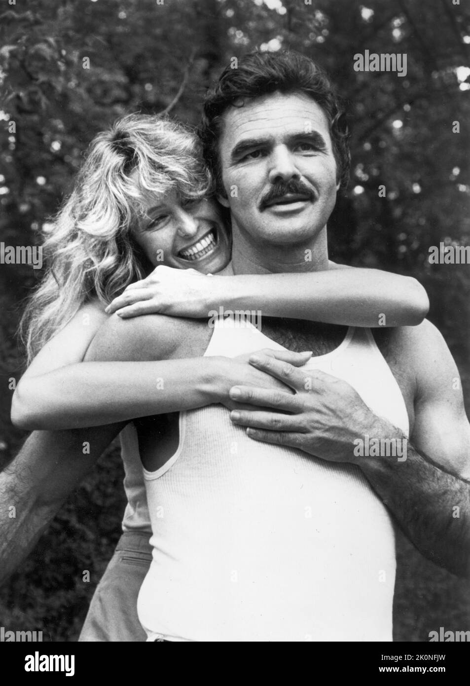 Farrah Fawcett Burt Reynolds On Set Of The Film The Cannonball Run