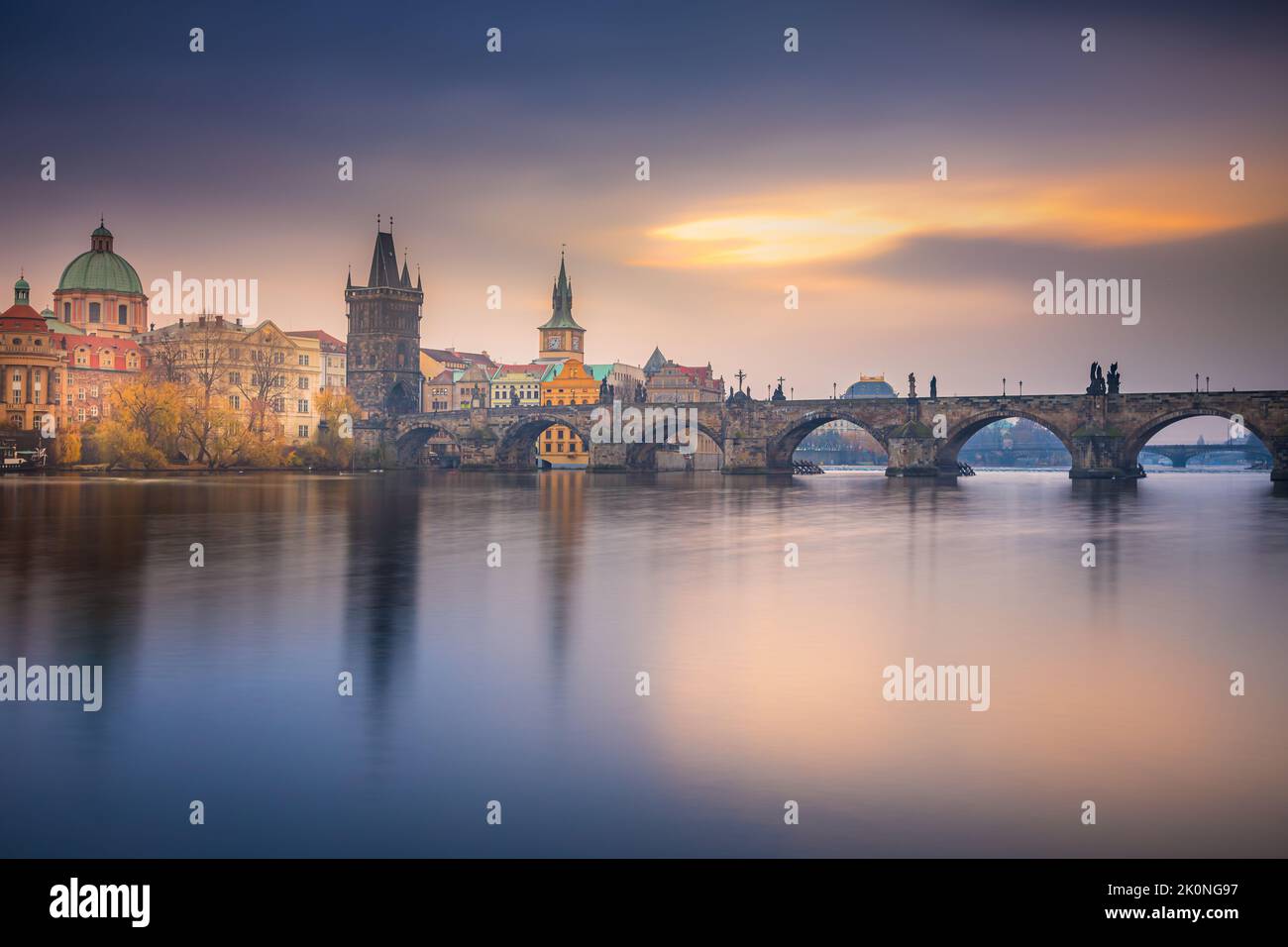 Charles bridge at sunset, peaceful medieval Prague, Czech Republic ...