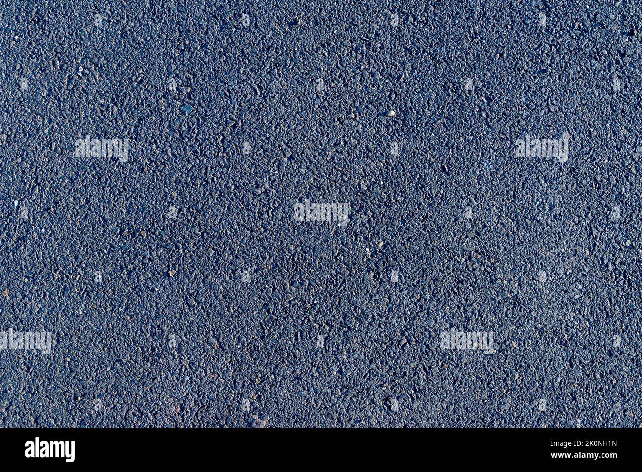 texture of new asphalt pavement with small stone and sand, selective ...
