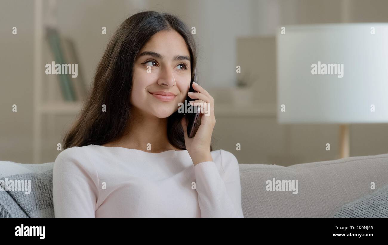 Arabian girl happy client talking mobile phone at home friendly ...