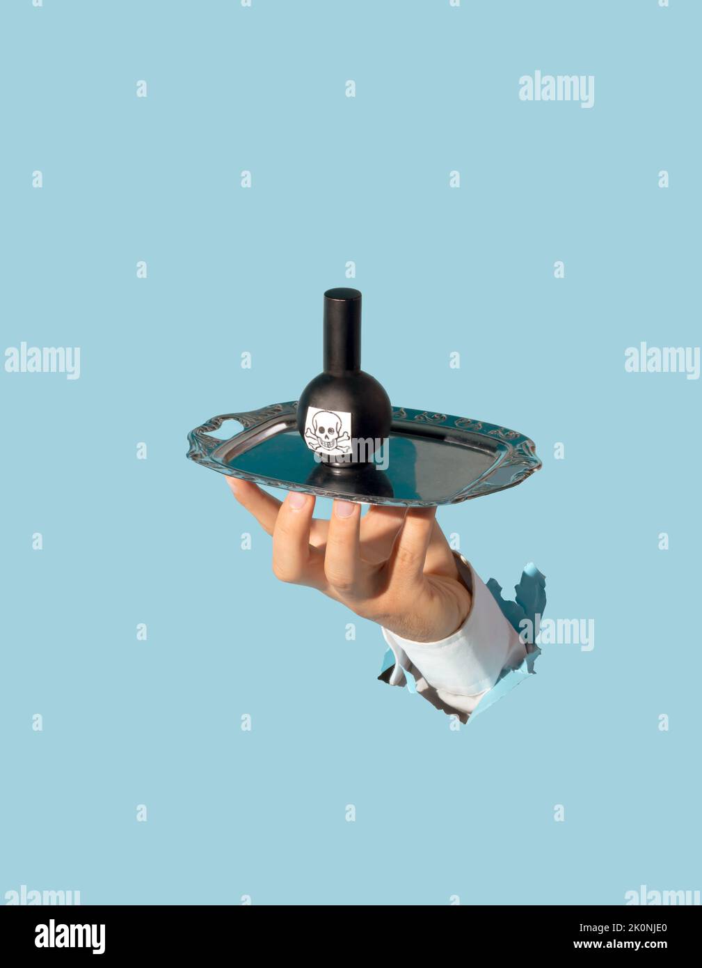 Hand holding bottle warning poison hi-res stock photography and images ...