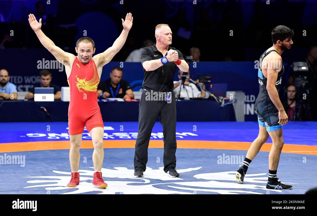 Belgrade. 12th Sep, 2022. China's Tuo Erbatu (L) celebrates after ...