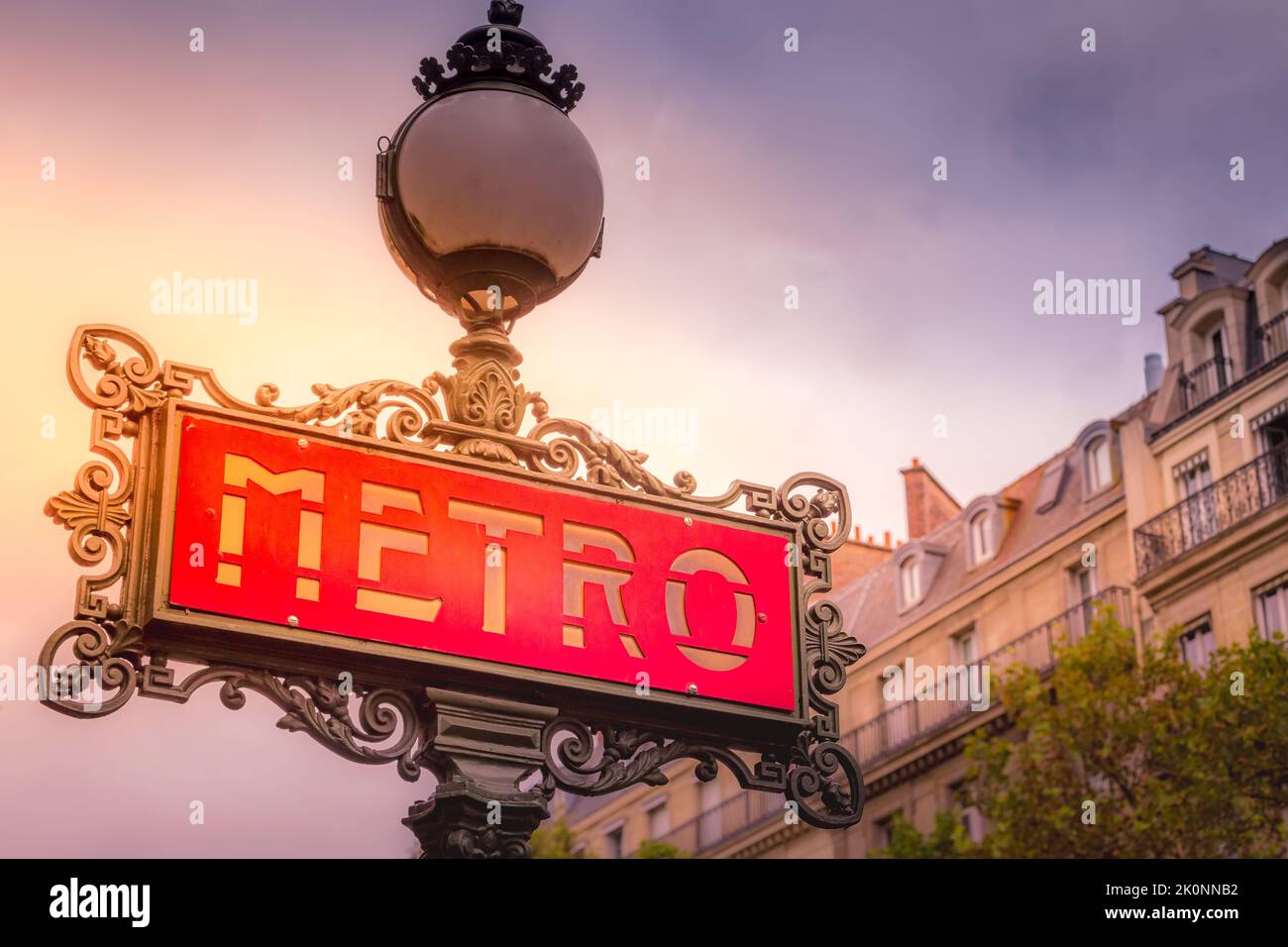 Retro Paris Metro sign in Montmartre, Paris at sunset, France Stock ...