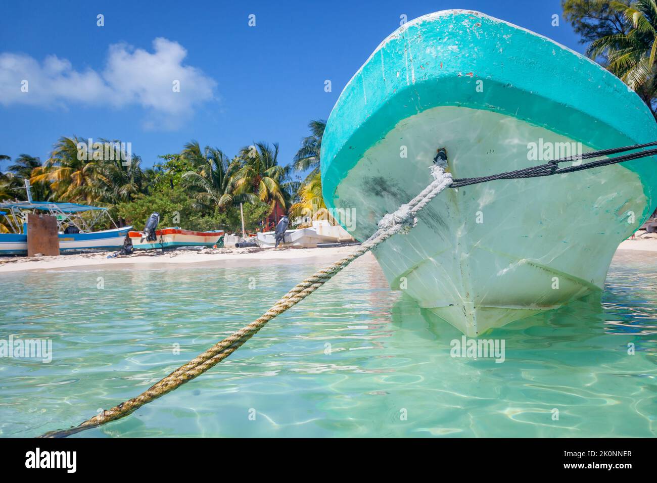 Cancun marina with rustic boat, caribbean beach at sunset, Riviera Maya ...