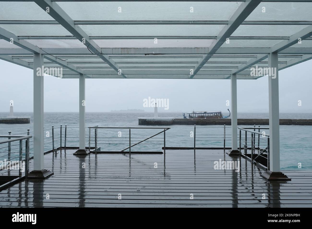 A rainy day at Malé presidential speedboat jetty, Maldives. North Male ...