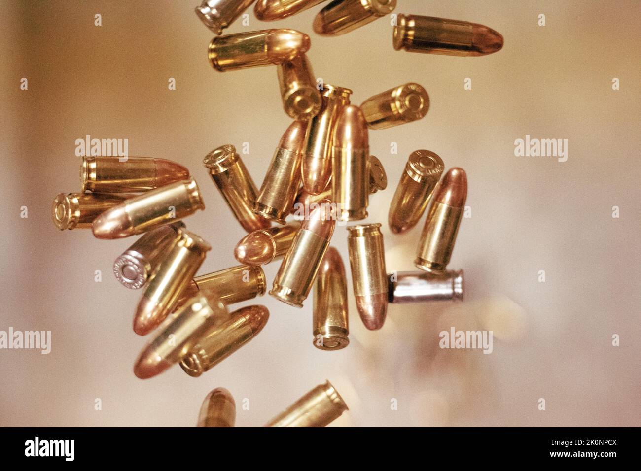 Bullets in Motion Stock Photo - Alamy