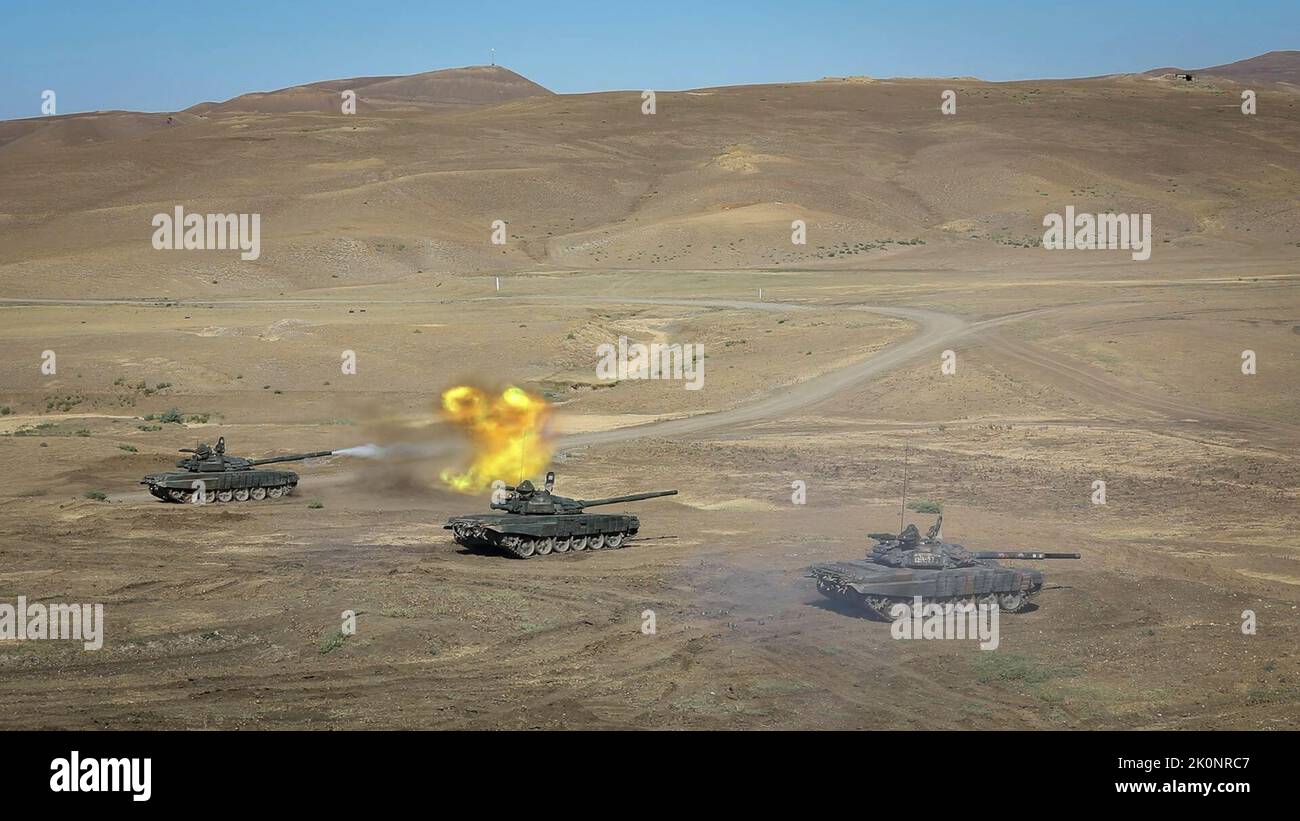 Three Georgian Armed Forces T-72 tanks fire during a combined arms live ...