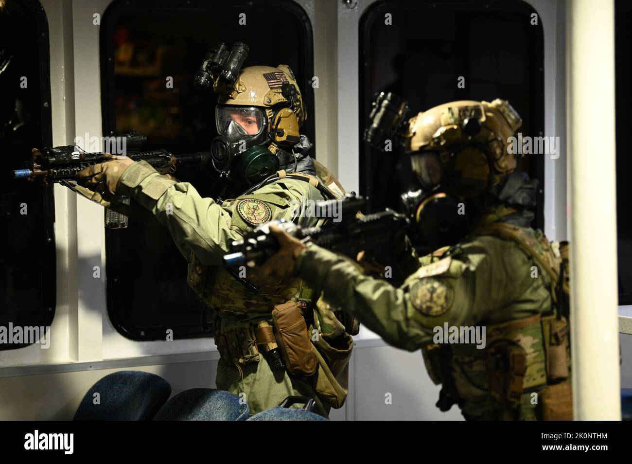 Two members from the Coast Guard Maritime Security Response Team East ...