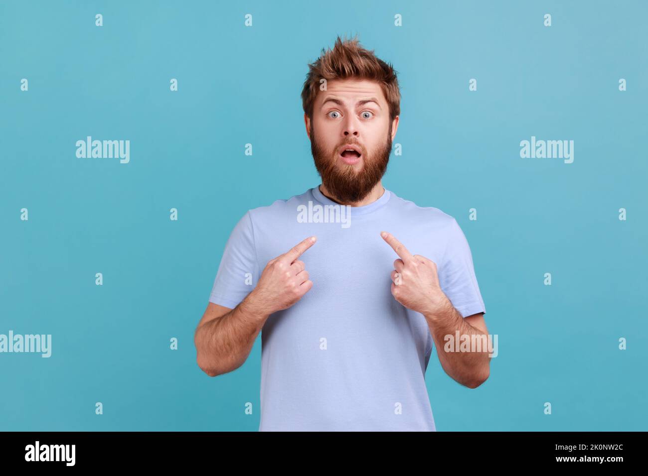 Wow, this is me. Portrait of astonished bearded man staring in ...