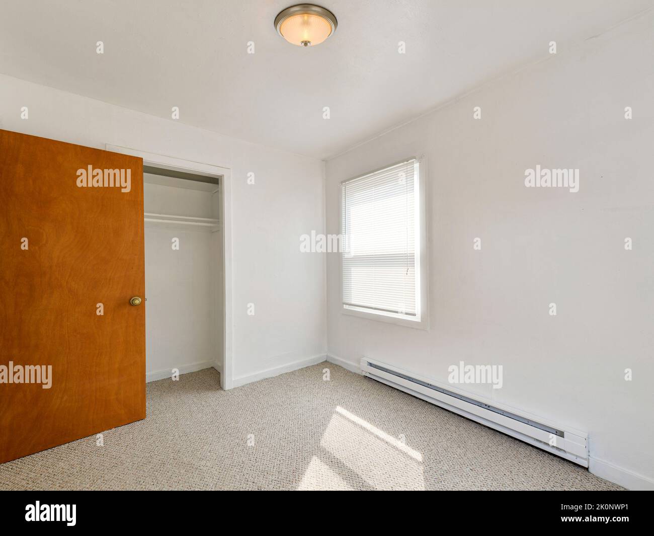 Modern residential empty bedroom interior Stock Photo - Alamy