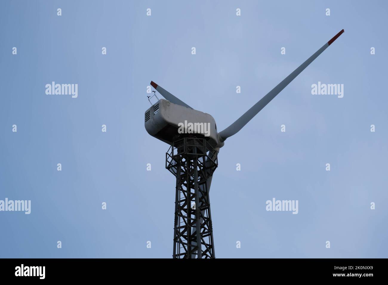 Windmill for electric power production on mountain and blue sky ...