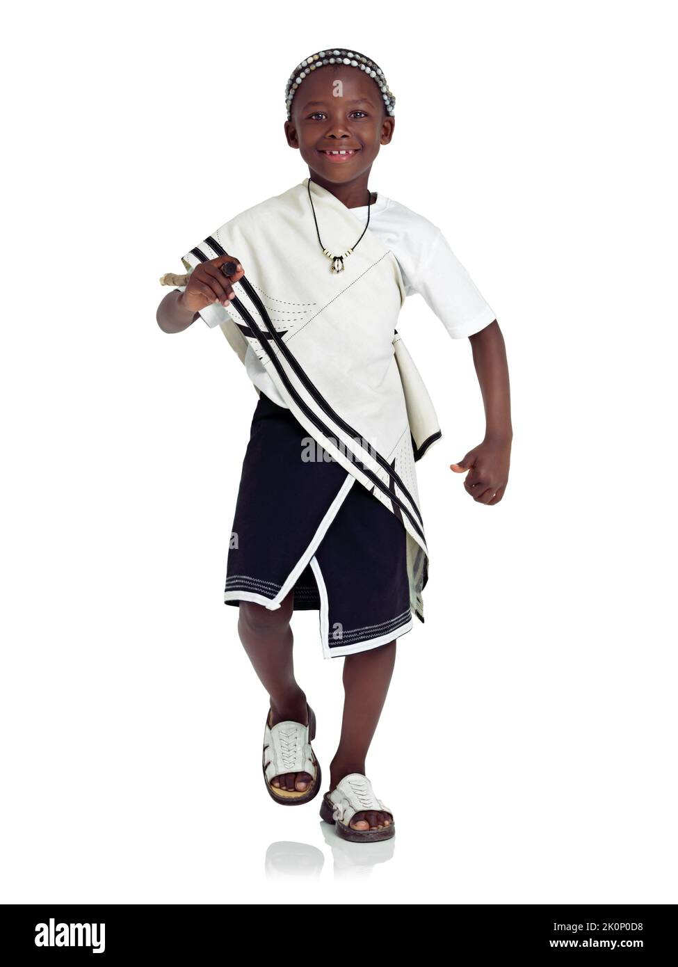 They grow up so fast. A young african boy against a white background ...