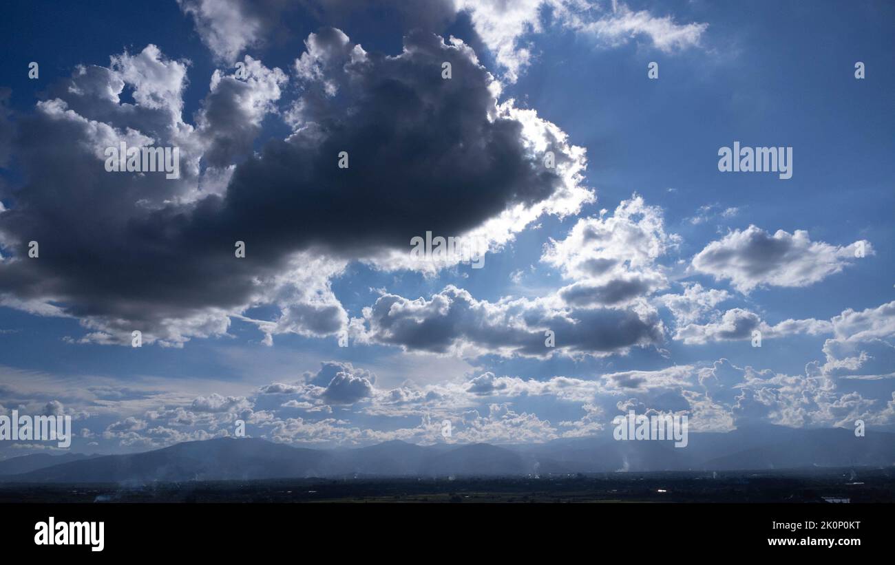 Aerial view of beautiful sunny blue sky with bright sun shining on ...