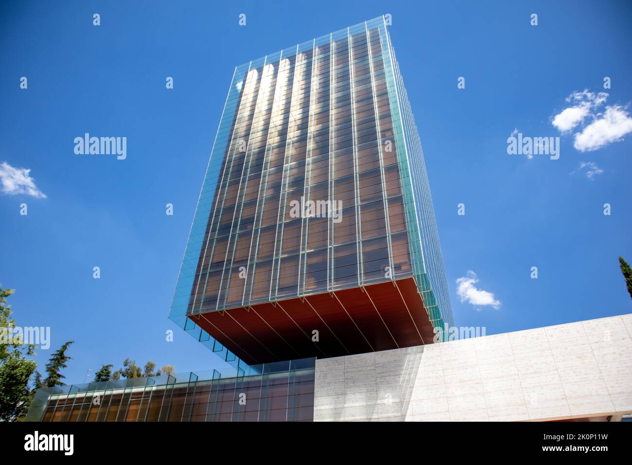 Madrid, Spain. July 1, 2022 A modern tall building with a glass facade ...