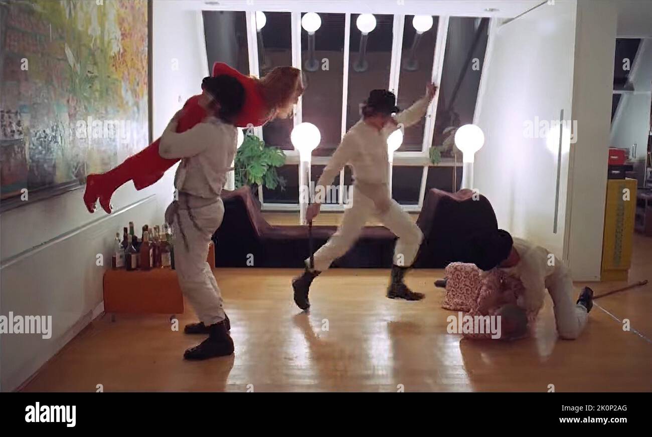 A FORBIDDEN ORANGE, (aka LA NARANJA PROHIBIDA), from left: Warren Clarke, holding Adrienne Corri ...