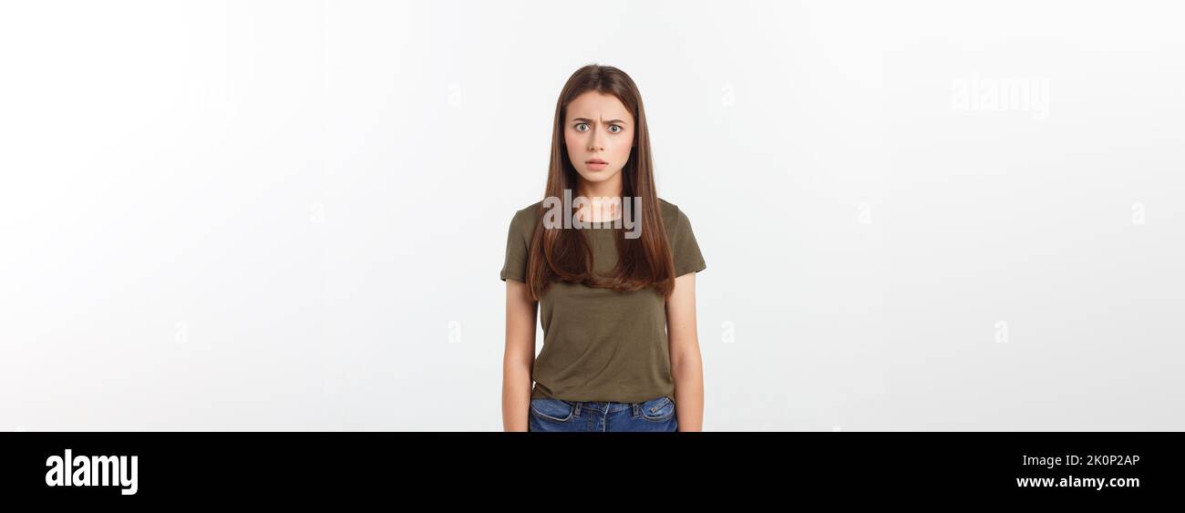 Isolated shot of speechless concerned shocked and angry woman ...