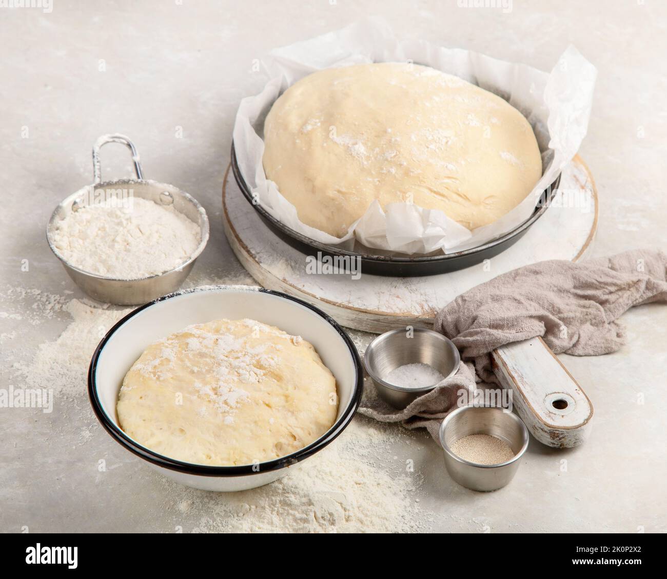 Raw dough pastry in a bowl on neutral background. Homemade bio food ...